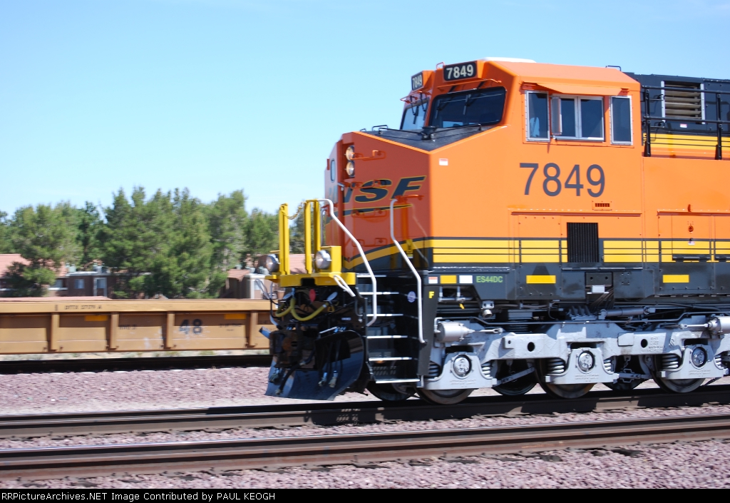 Close up side shot of the crew cab of BNSF 7849 a very clean and Brand New ES44DC.
